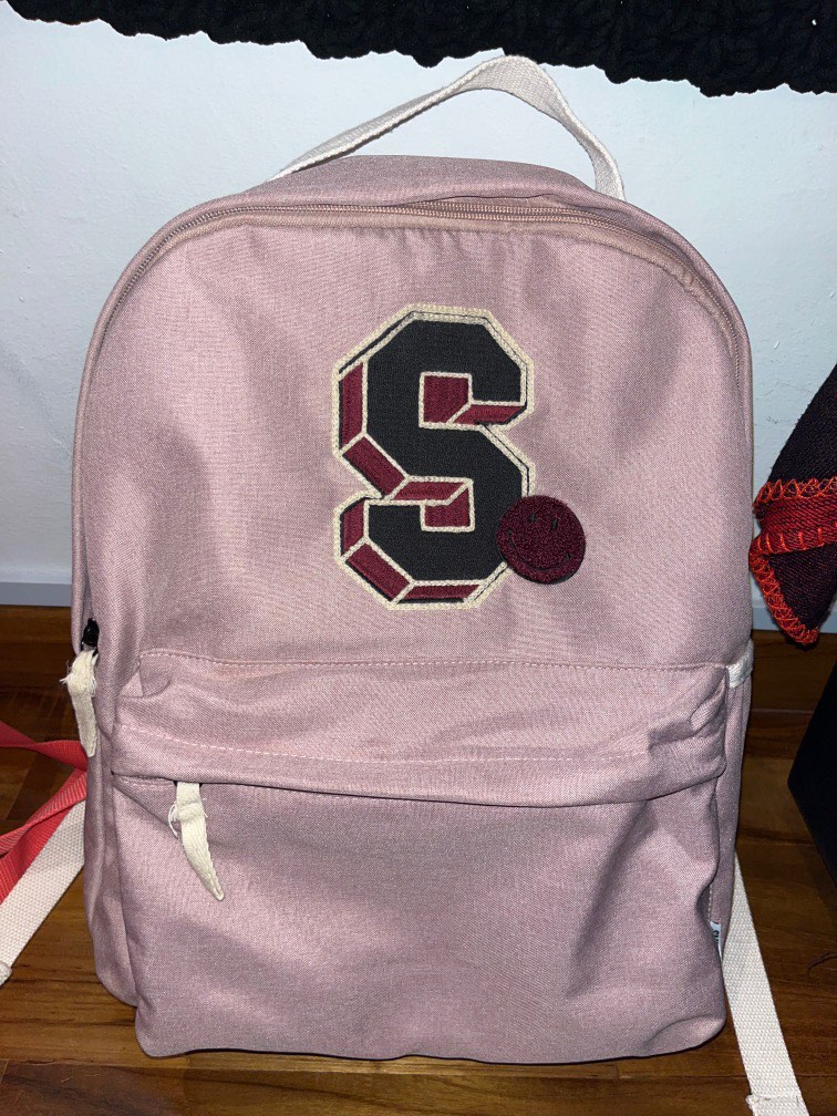 Typo smiley pink backpack, Women's Fashion, Bags & Wallets, Backpacks ...