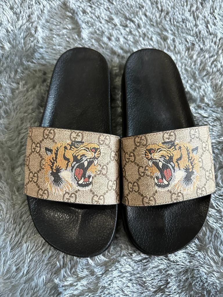 Gucci Tiger Slides on Carousell
