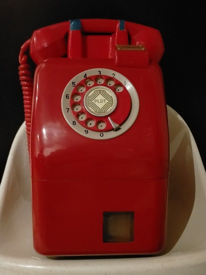 red pay phone on Carousell