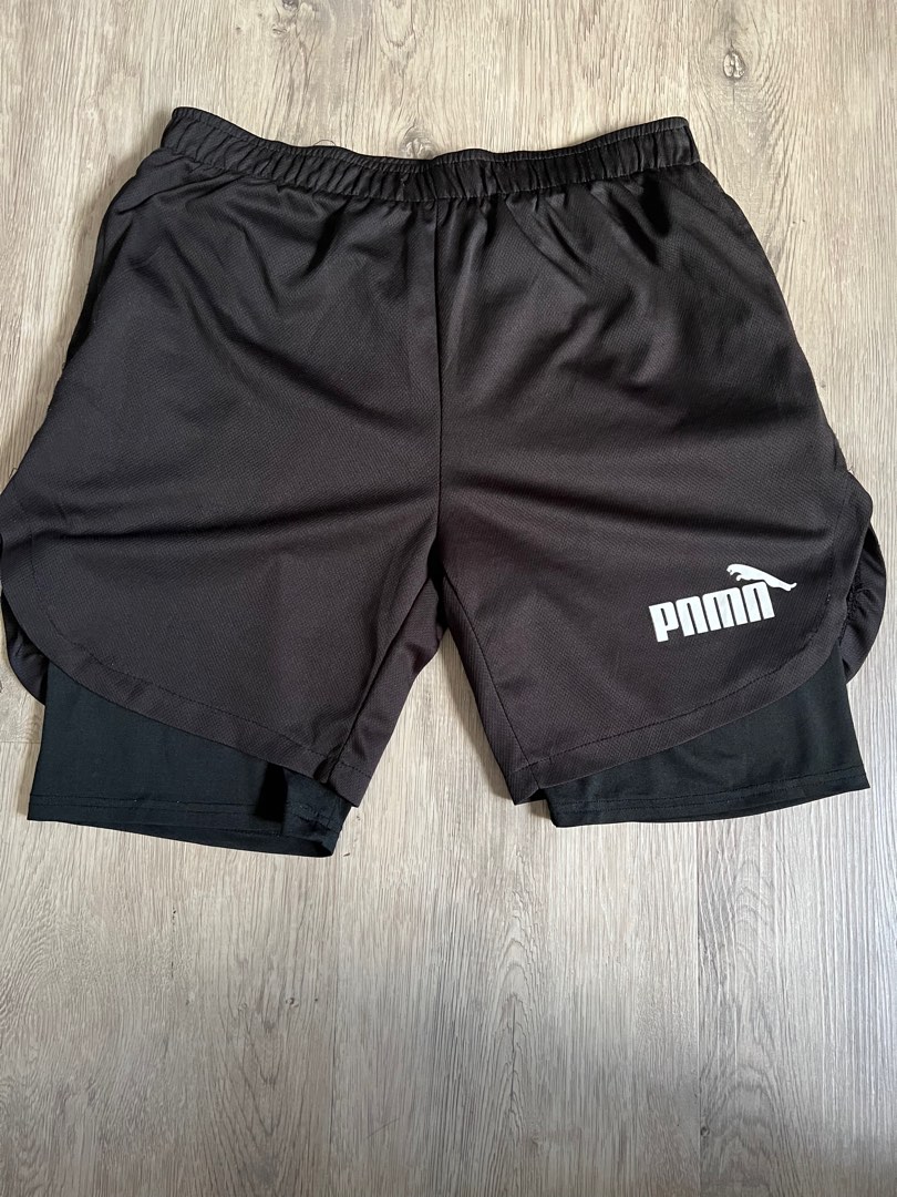 Puma Shorts with compression, Men's Fashion, Bottoms, Shorts on Carousell
