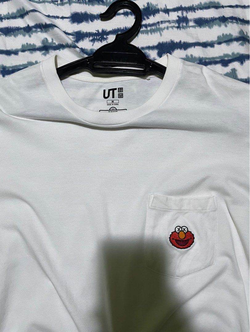 Uniqlo Kaws Elmo, Men's Fashion, Tops & Sets, Tshirts & Polo Shirts on ...