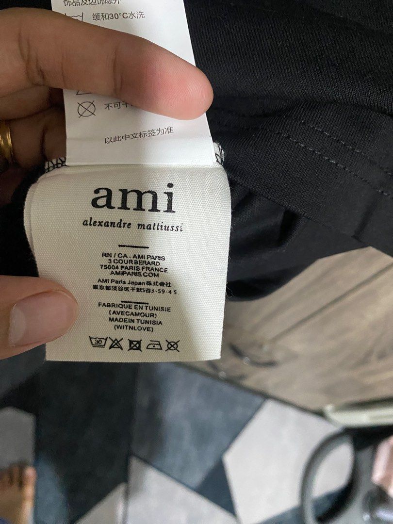 AMI red patch logo on Carousell