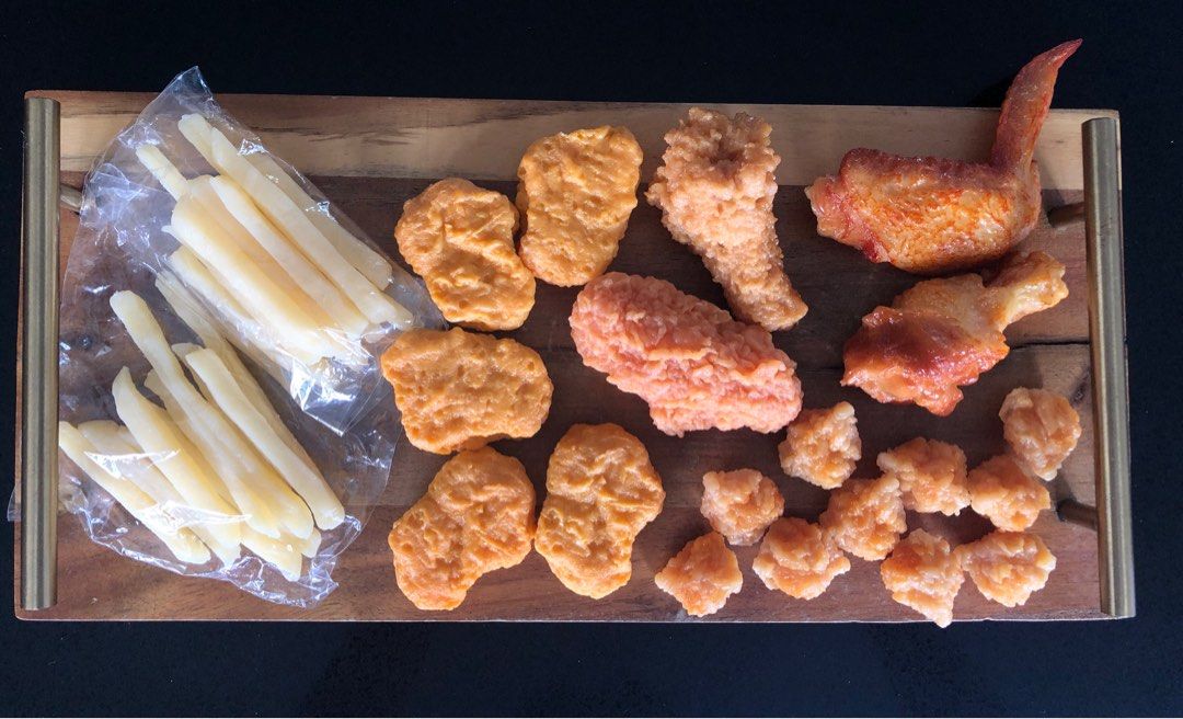 Fried chicken, chicken nuggets, popcorn chicken and French fries food ...