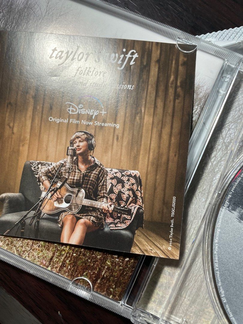 SIGNED Taylor Swift Evermore CD album on Carousell