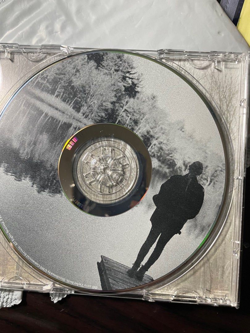 SIGNED Taylor Swift Evermore CD album on Carousell