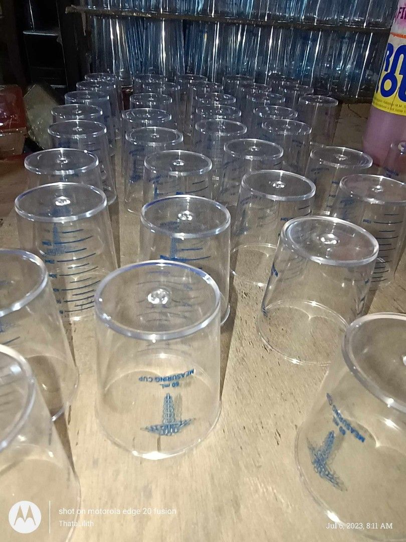60ml calibrated measuring cups with doctors logo on Carousell