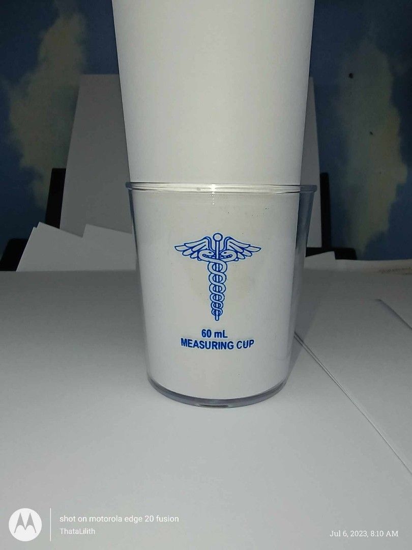 60ml calibrated measuring cups with doctors logo on Carousell