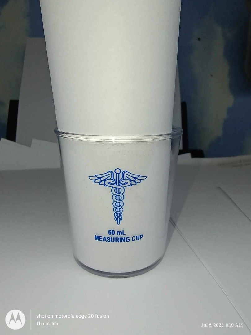 60ml calibrated measuring cups with doctors logo on Carousell