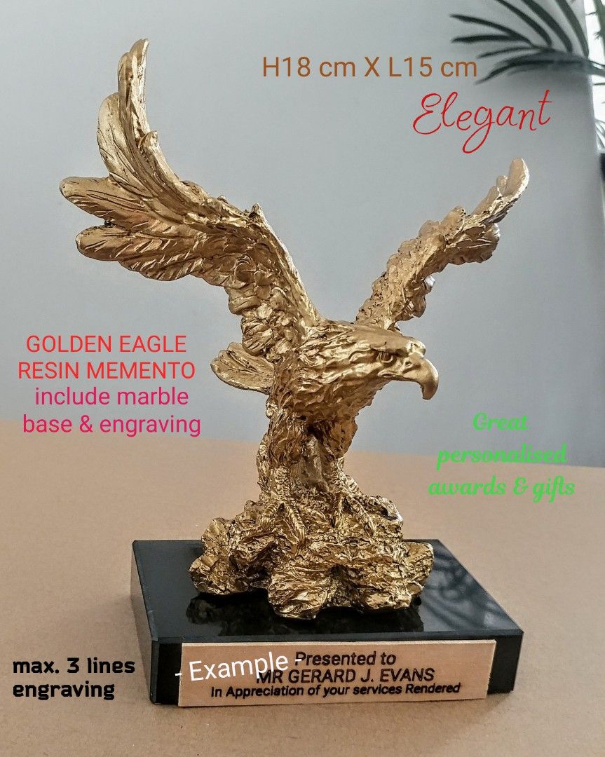 Memento, token of appreciation awards etc. Golden eagle figurine on ...