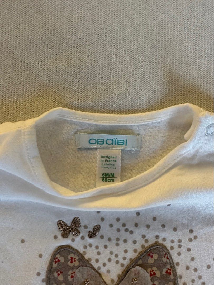 Obaibi baby white top on Carousell