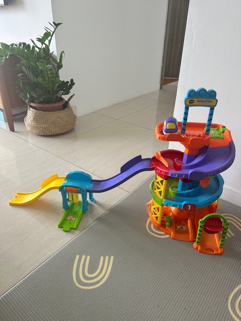 Vtech TOOT TOOT driver parking garage, Babies & Kids, Infant Playtime ...