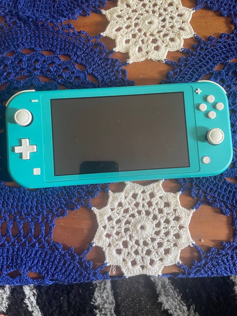 Turquoise Nintendo Switch Lite, Video Gaming, Video Game Consoles, Nintendo on Carousell