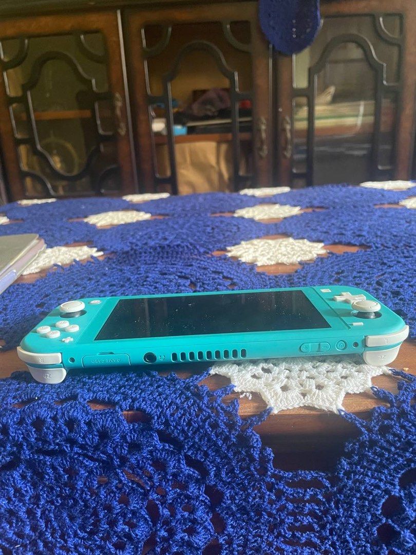 Turquoise Nintendo Switch Lite, Video Gaming, Video Game Consoles, Nintendo on Carousell