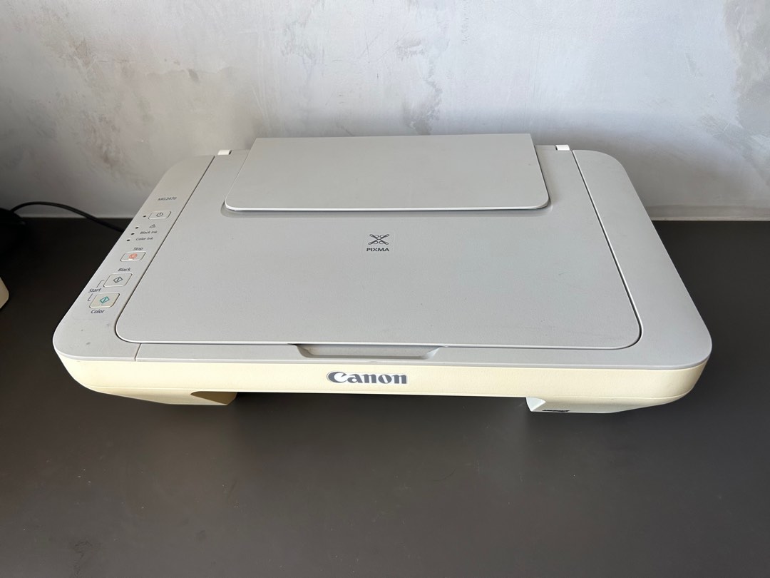 Canon colour printer/scanner MG2470 with extra ink - works fine ...
