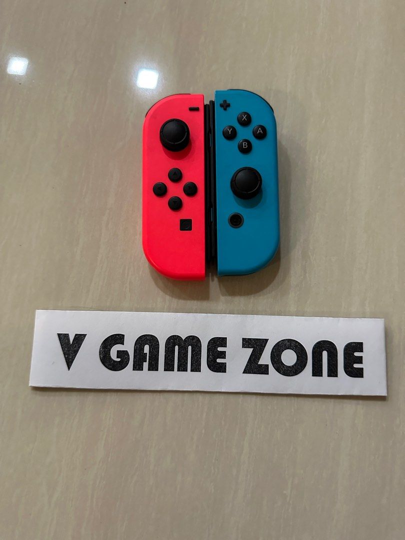 Original Nintendo Switch Joycon Neon Red and Blue, Video Gaming, Gaming ...