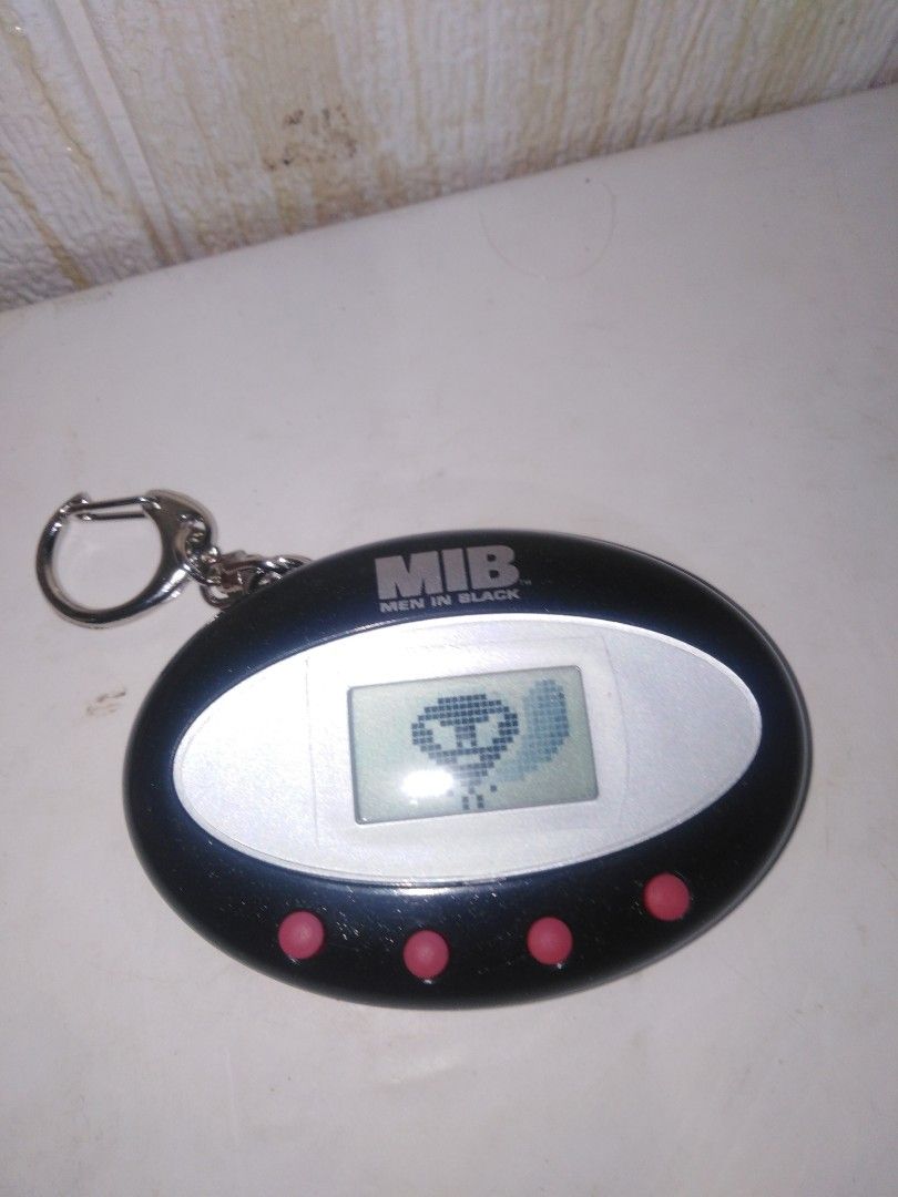 Super Rare MEN IN BLACK (MIB) Game Wave UFO Tamagotchi, Hobbies & Toys ...