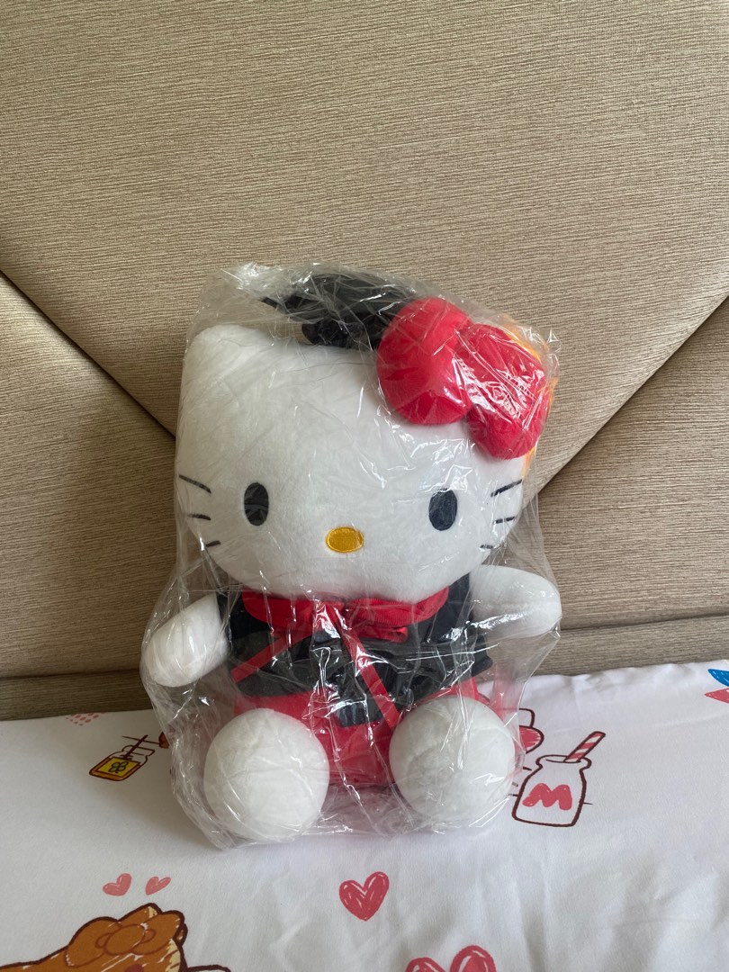 Hello kitty plushie - graduate, Hobbies & Toys, Toys & Games on Carousell