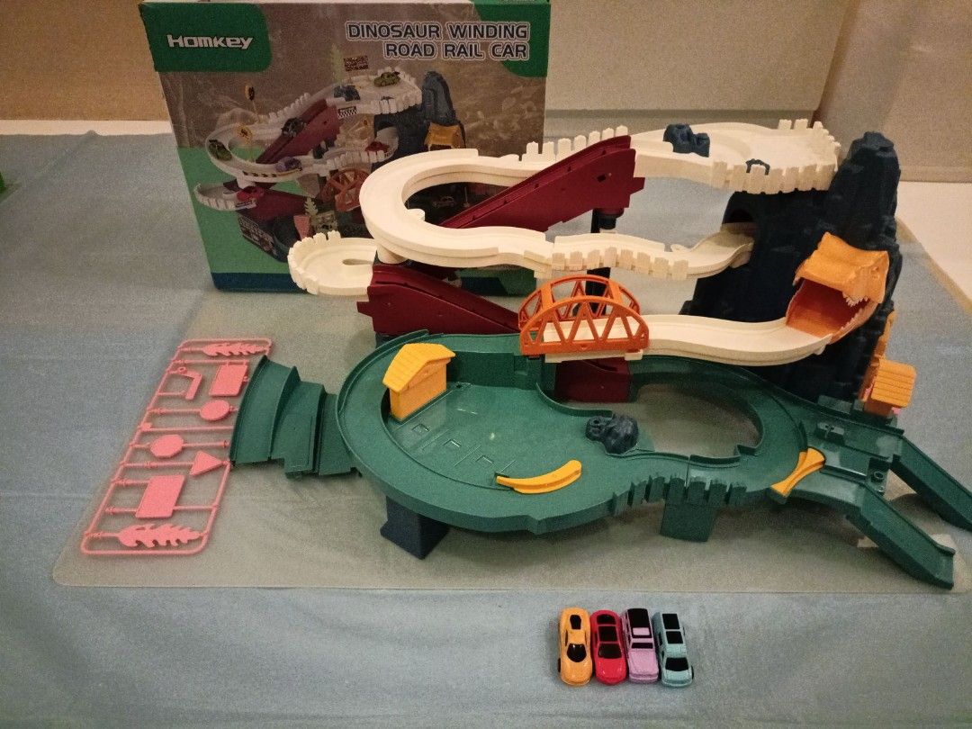 Mainan anak dinosaur winding road rail car MK-L-1568, Toys & Collectibles, Mainan di Carousell