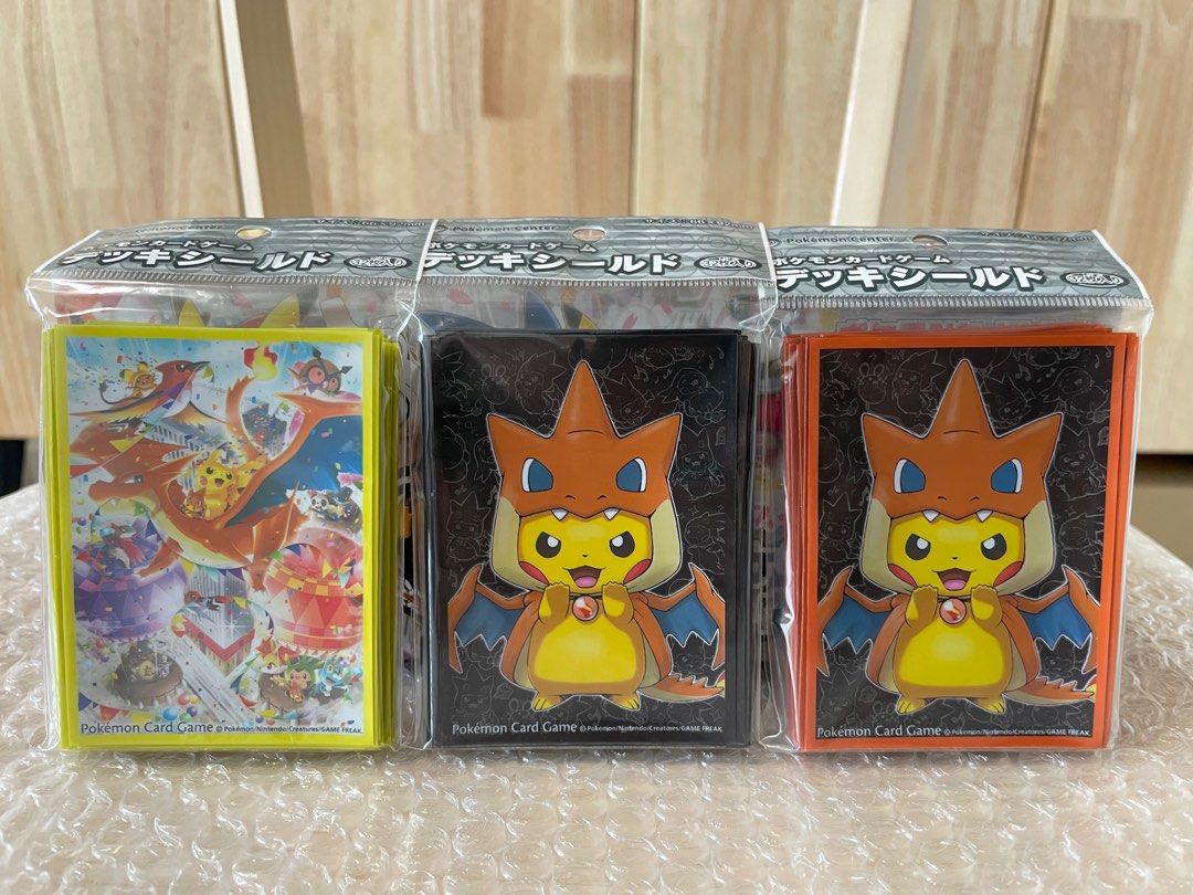 Pokemon TCG Poncho Pikachu Mega Charizard Y Sleeves, Hobbies & Toys ...