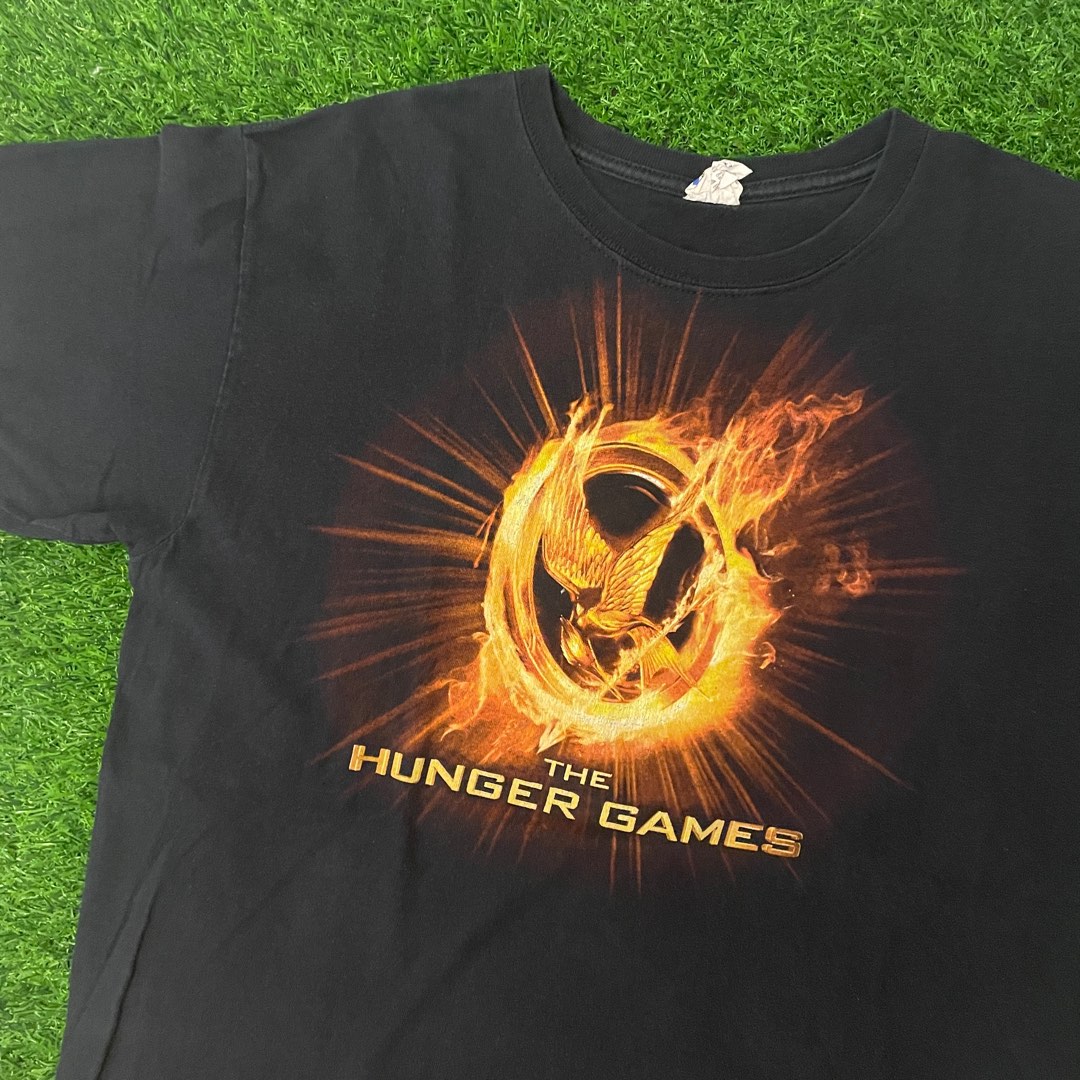 2012 The Hunger Games Movie Promo Tee, Men's Fashion, Tops & Sets ...