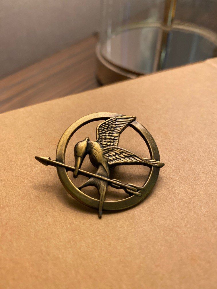 Mockingjay pin from Hunger Game, Women's Fashion, Jewelry & Organisers ...
