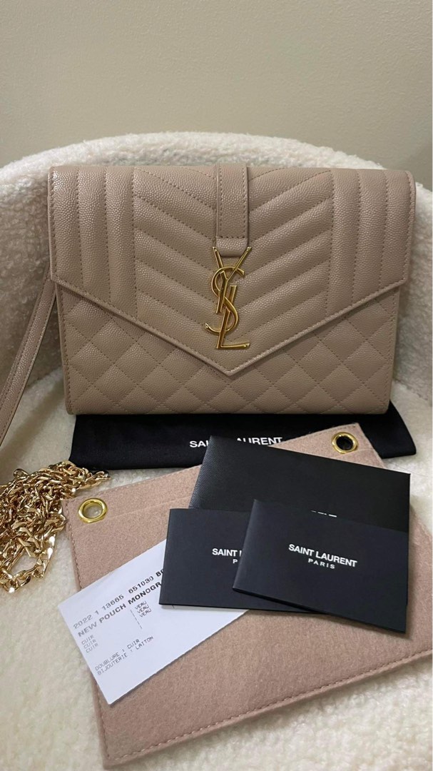Ysl beige clutch, Luxury, Bags & Wallets on Carousell