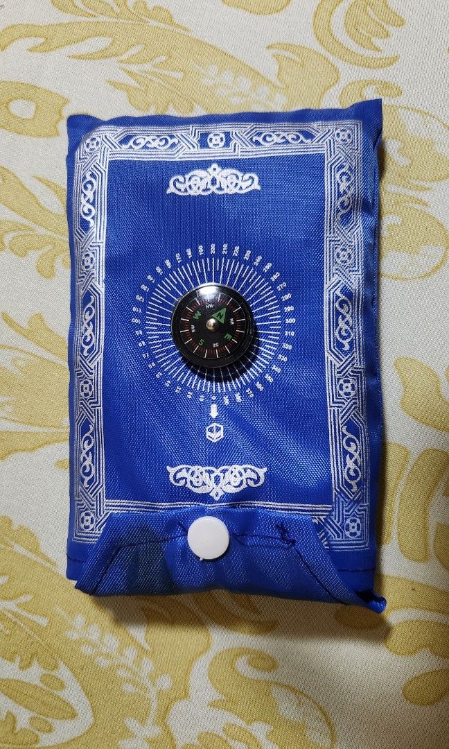 Free pocket Sejadah with Compass, Hobbies & Toys, Travel, Travel ...