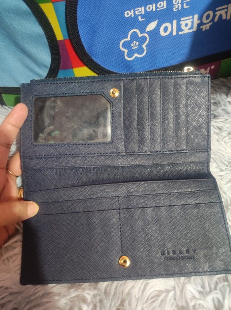 Sisley slim Bifold wallet, Luxury, Bags & Wallets on Carousell