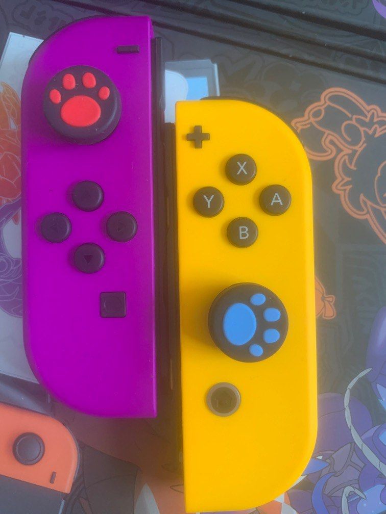 Nintendo Switch Joycon purple orange, Video Gaming, Gaming Accessories ...