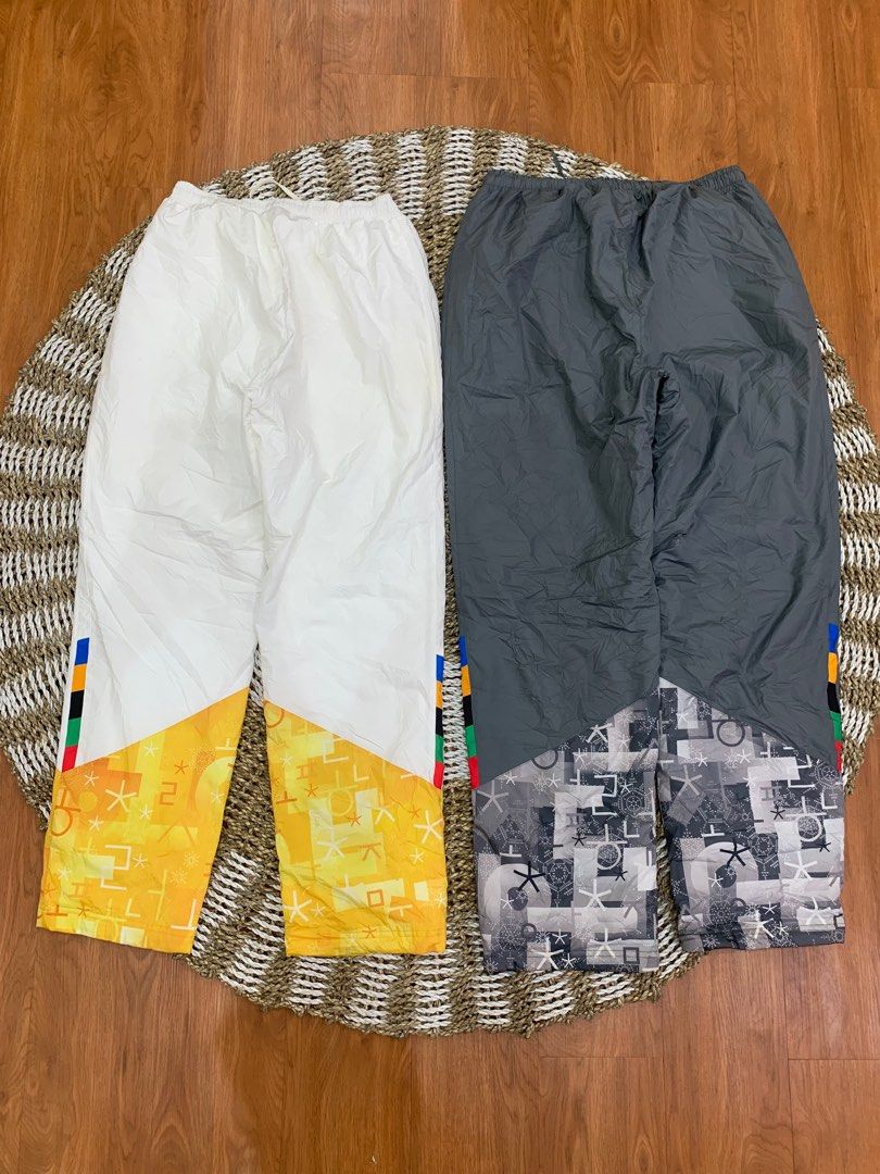 TNF olympic torch relay 2018 puffer pants, Fesyen Pria, Pakaian ...