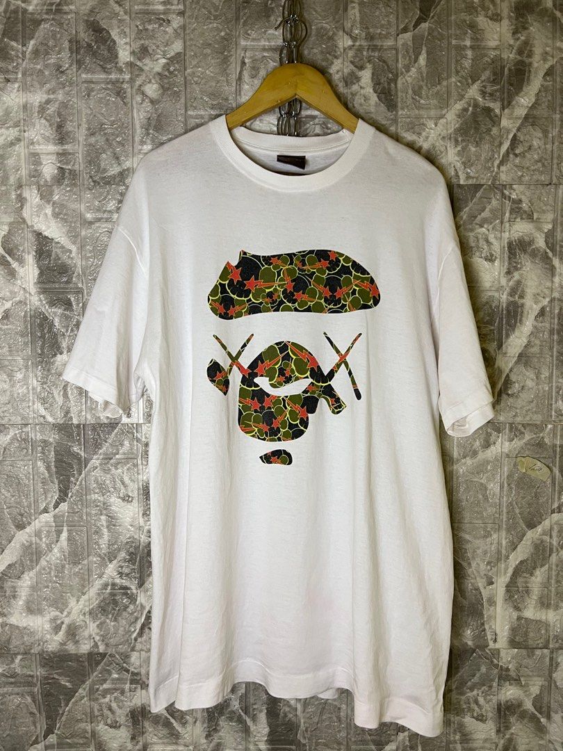 Bape x Kaws OG 1st Collab Big Face Kaws Camou Tee, Men's Fashion, Tops ...