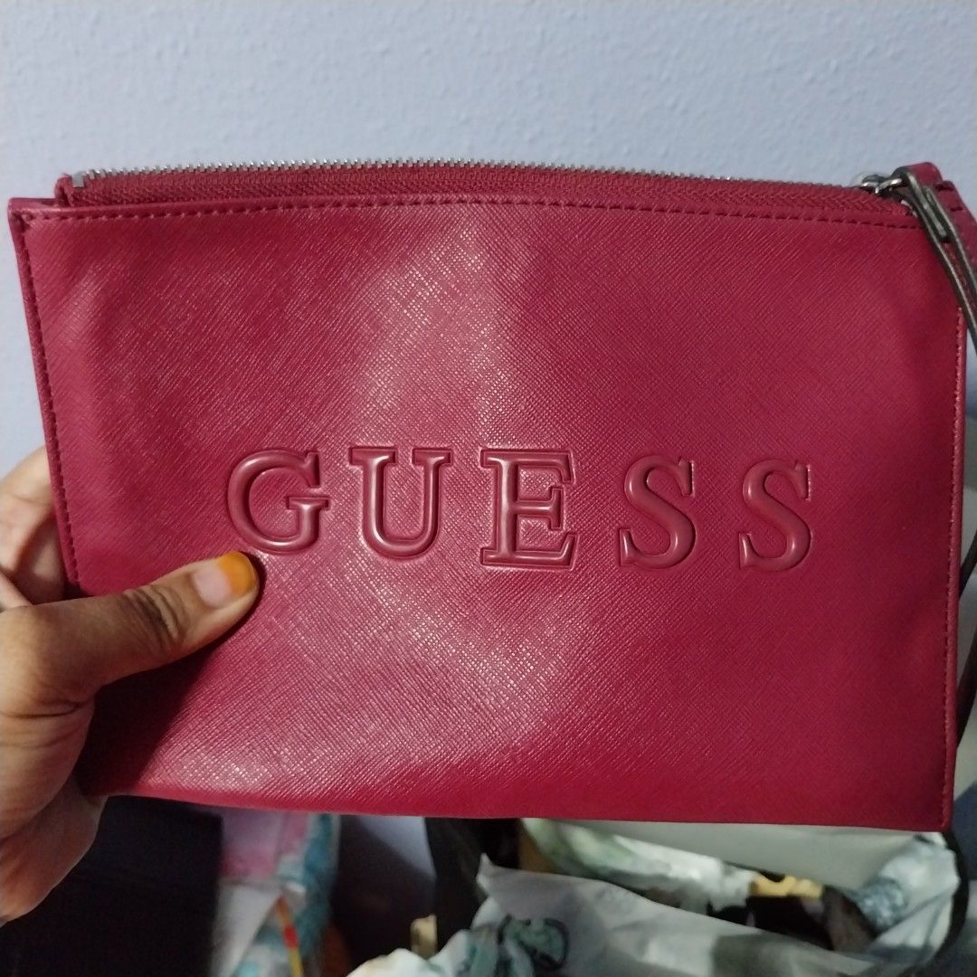 Guess pouch, Women's Fashion, Bags & Wallets, Purses & Pouches on Carousell