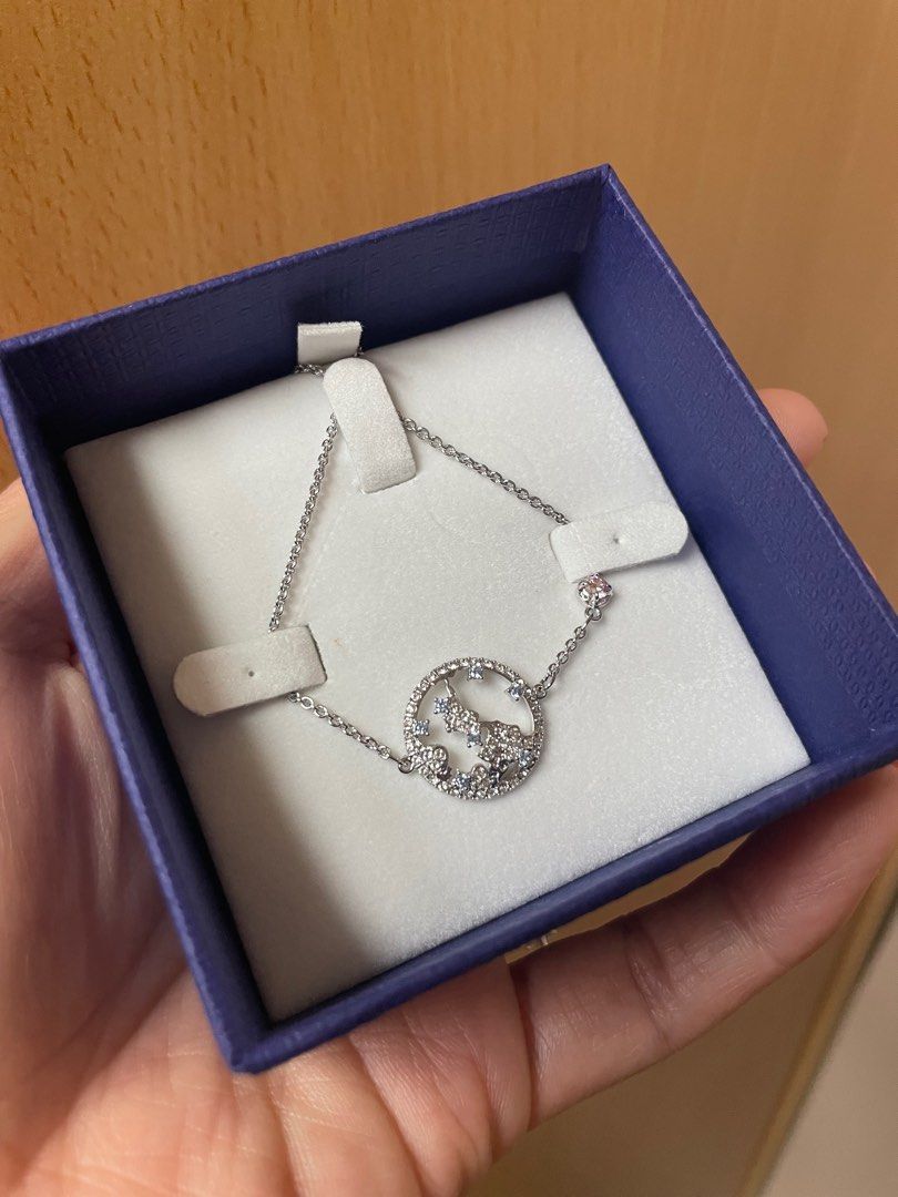 Swarovski Travel exclusive - Globe bracelet, Men's Fashion, Watches ...