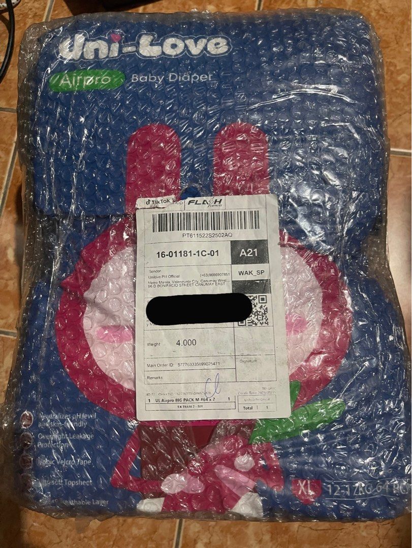 Unilove XL tape diaper, Babies & Kids, Bathing & Changing, Diapers ...