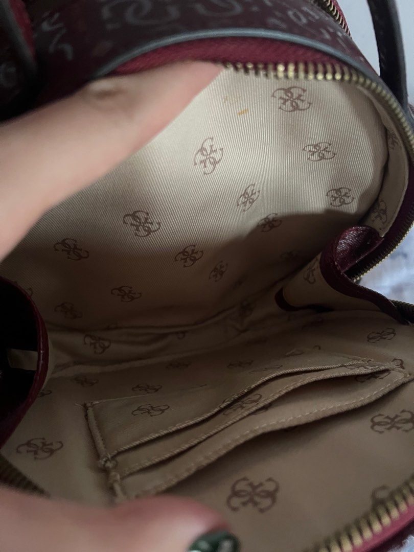 Guess round sling bag, Luxury, Bags & Wallets on Carousell