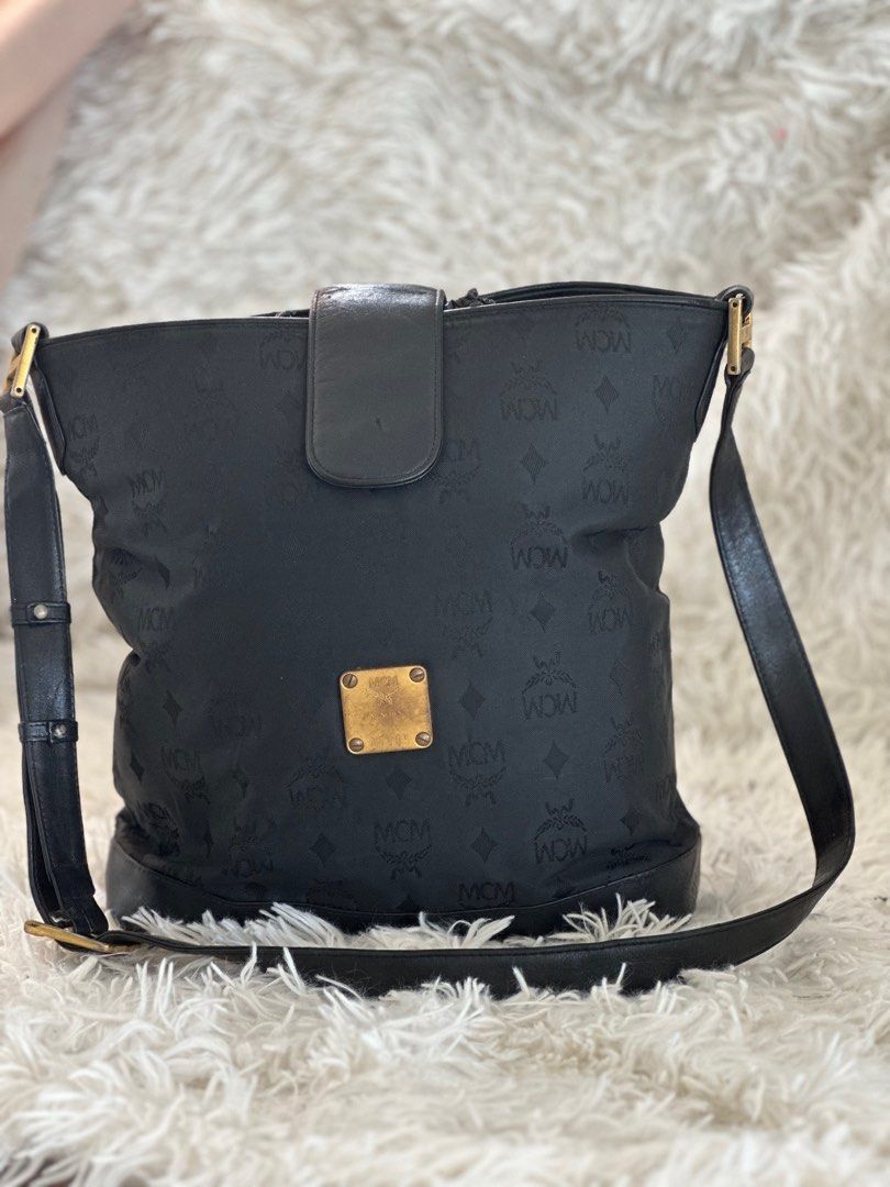MCM germany canvas and leather sling, Luxury, Bags & Wallets on Carousell