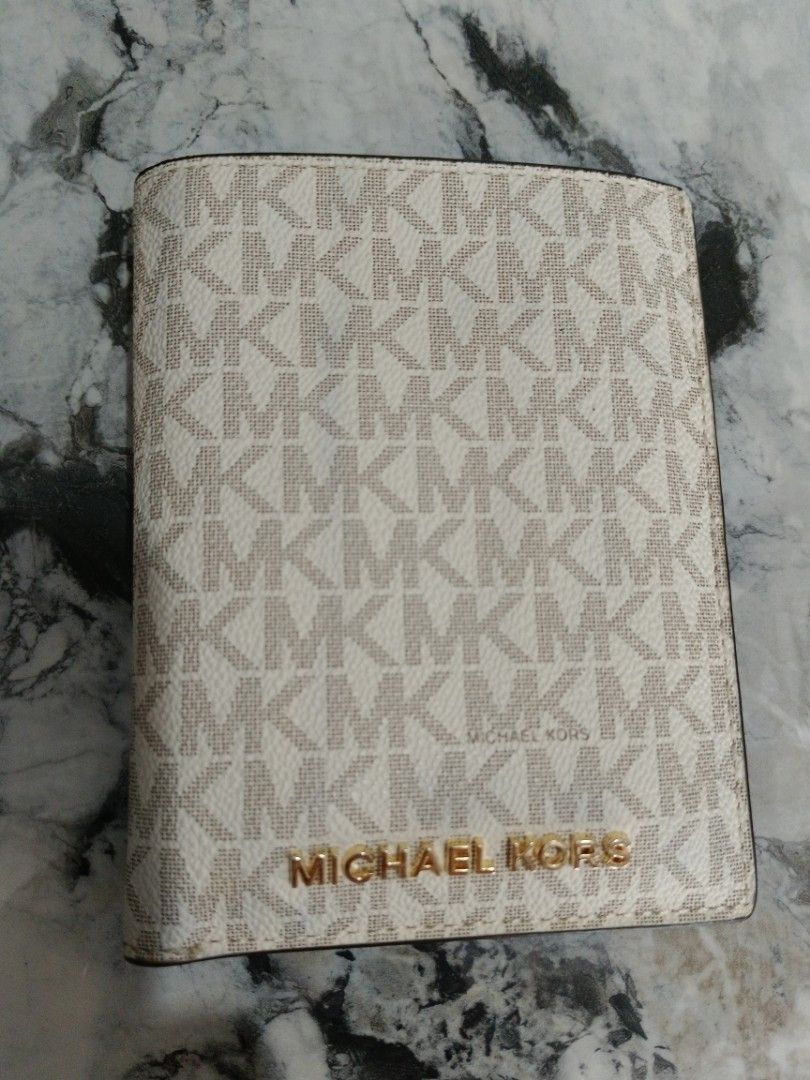 MICHAEL KORS Passport Holder, Luxury, Bags & Wallets on Carousell