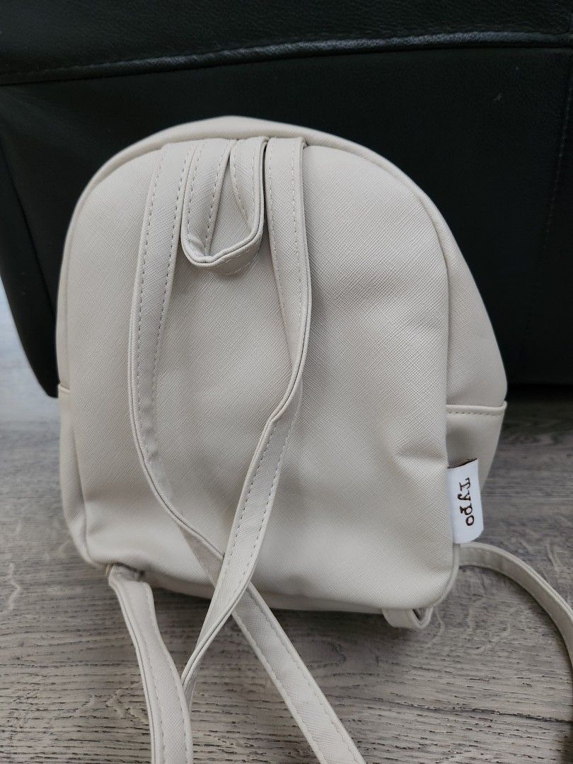 Typo Pusheen Backpack, Women's Fashion, Bags & Wallets, Backpacks on ...