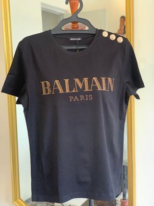 Balmain Shirt black bids font with button on Carousell