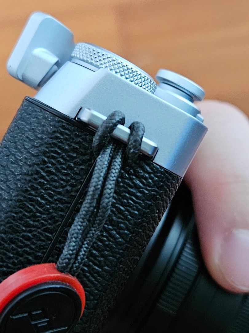 Fujifilm X-E4 (silver) w thumb rest & 2x grips, Photography, Cameras on Carousell