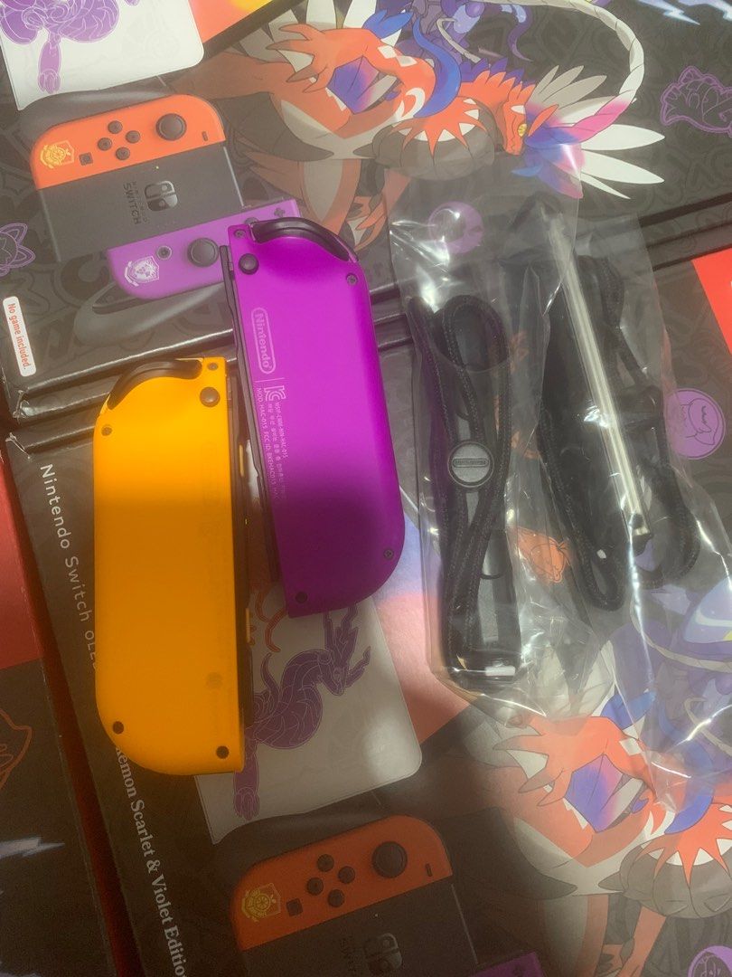Nintendo Switch Joycon purple orange, Video Gaming, Gaming Accessories ...