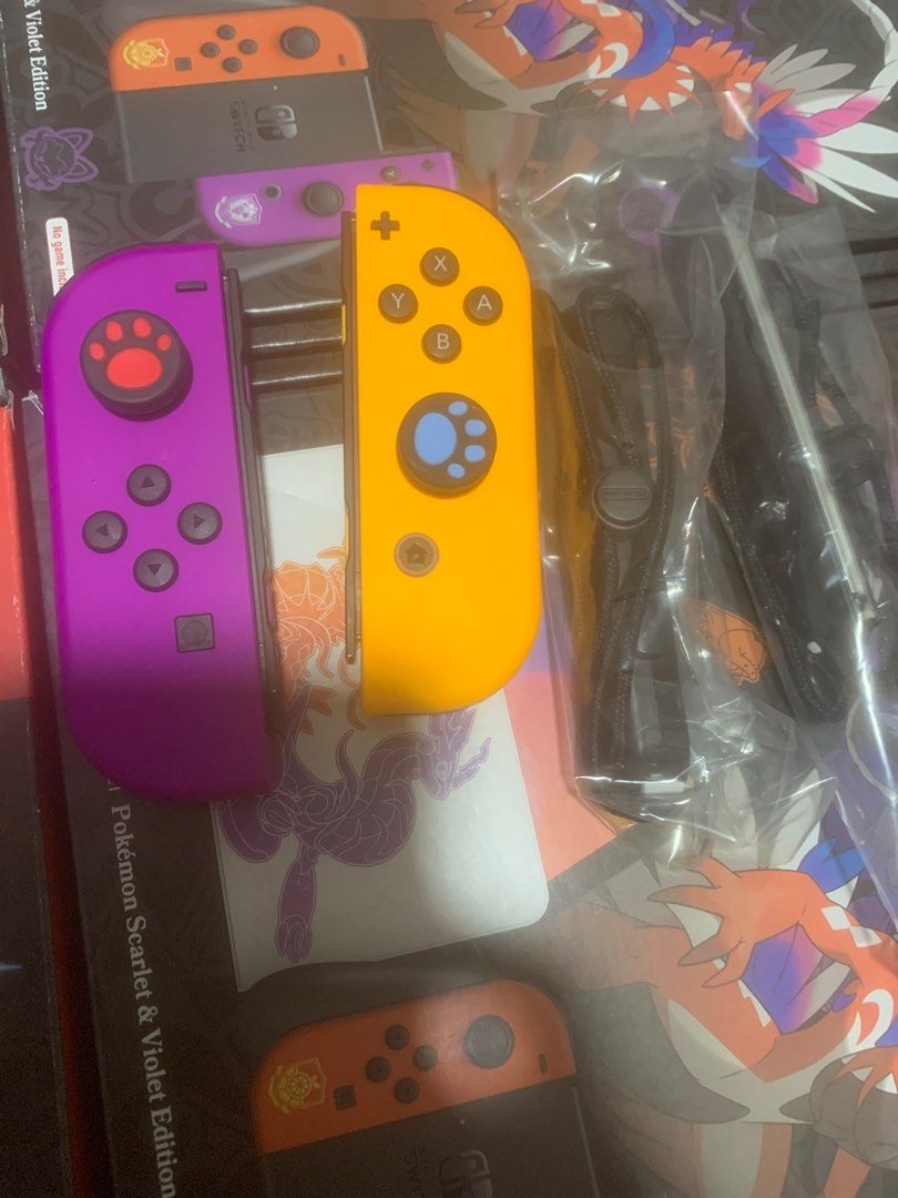 Nintendo Switch Joycon purple orange, Video Gaming, Gaming Accessories ...