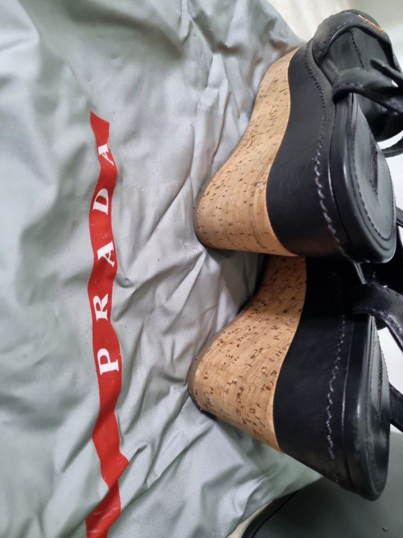 Prada wedge with gold brand, Luxury, Sneakers & Footwear on Carousell