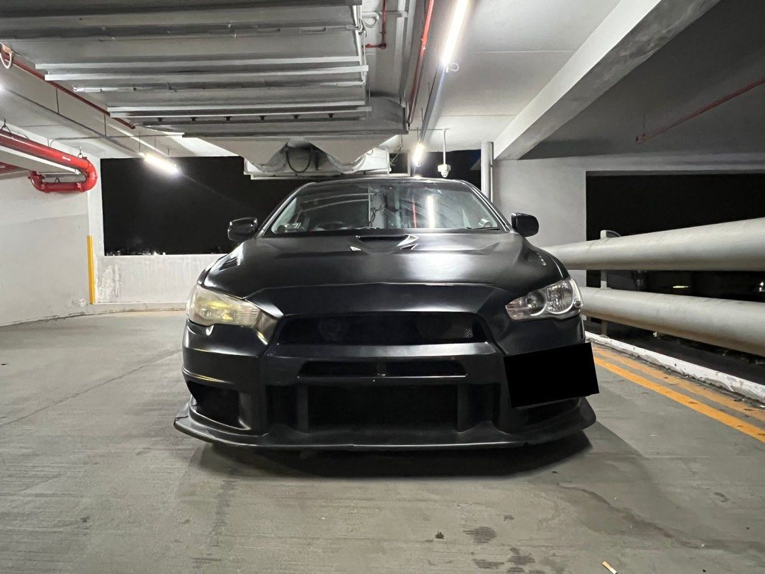 Matte black lancer EX, Cars, Car Rental on Carousell