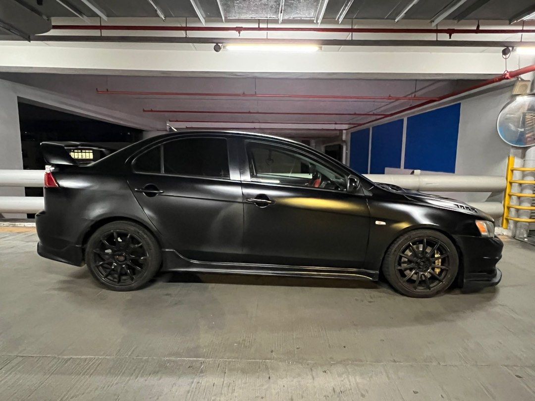 Matte black lancer EX, Cars, Car Rental on Carousell