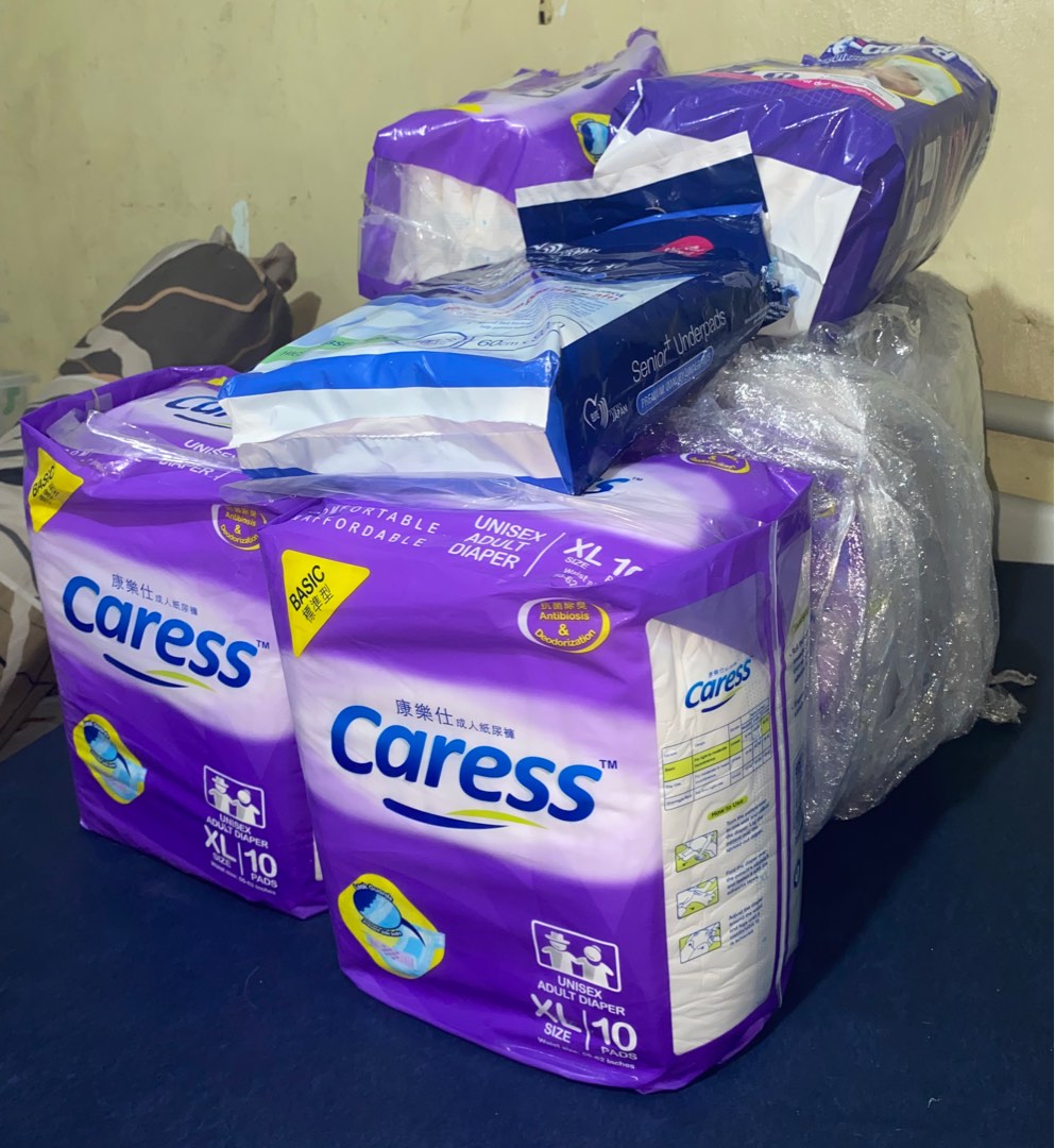 Caress XL 9 packs (Free sureguard XL and Bed pads), Health & Nutrition ...