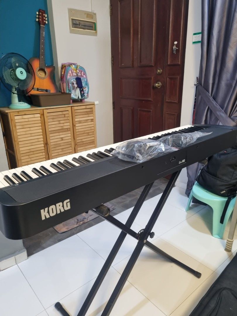 Korg with stand, Hobbies & Toys, Music & Media, Musical Instruments on ...