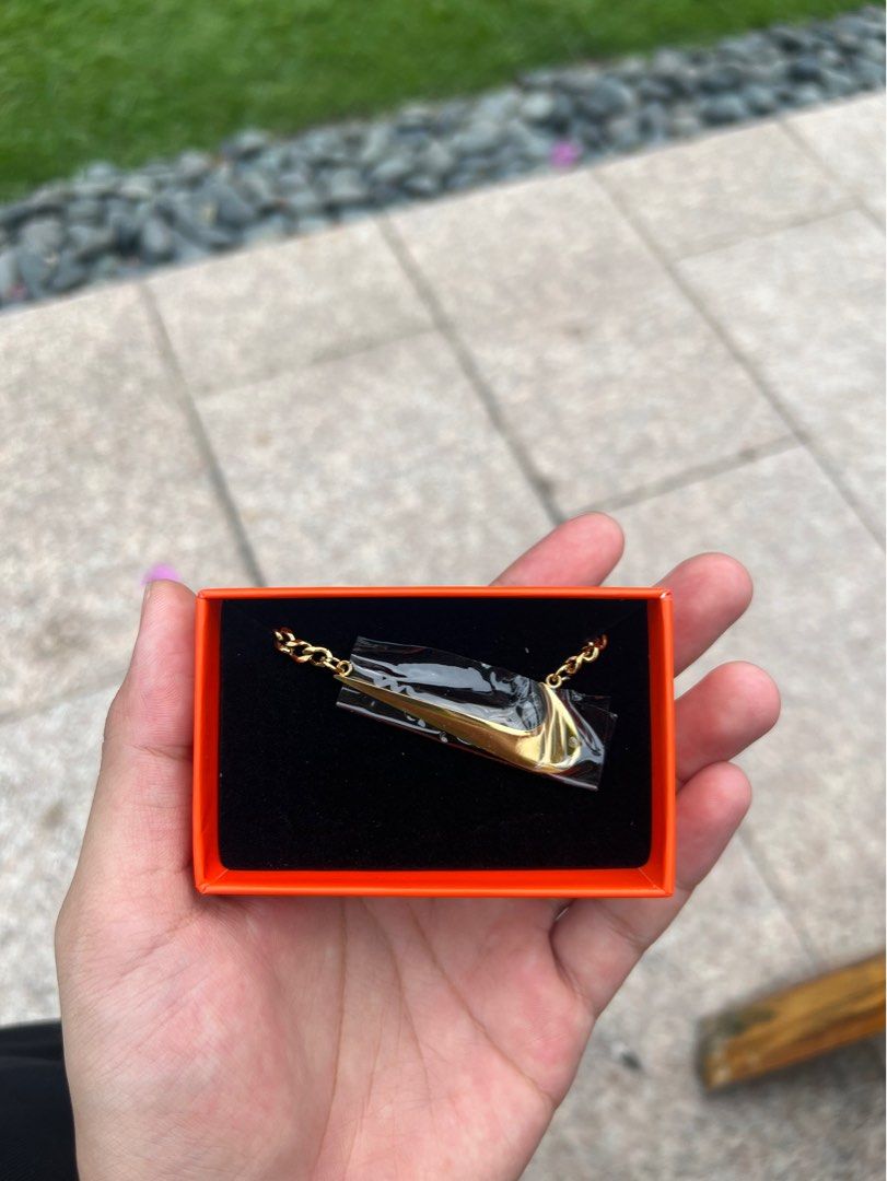 NIKE GOLD SWOOSH NECKLACE, Men's Fashion, Watches & Accessories ...