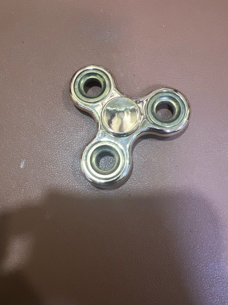 Rose gold fidget spinner, Hobbies & Toys, Toys & Games on Carousell