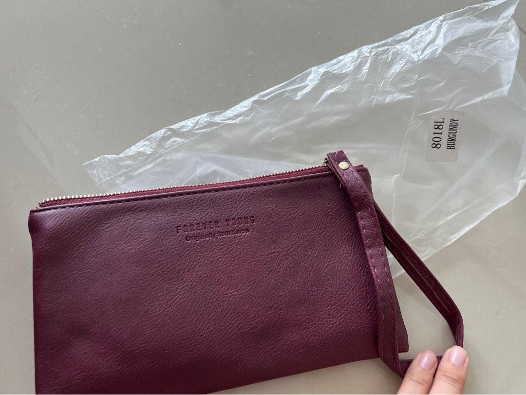 FOREVER YOUNG POUCH, Women's Fashion, Bags & Wallets, Purses & Pouches ...